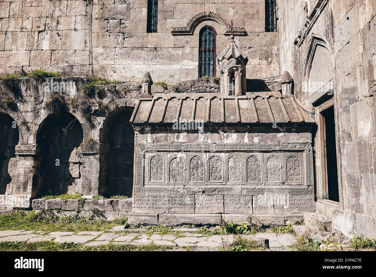 Ancient Stone Monastery with Intricate Carvings and Arched Architecture ...