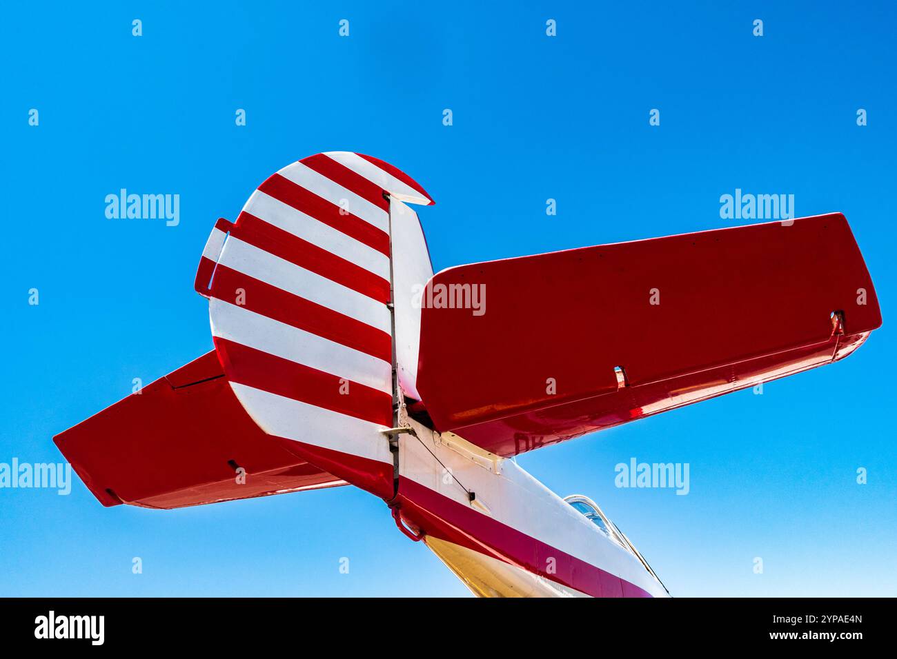 The back of the fuselage of a light-engine aircraft against the sky ...