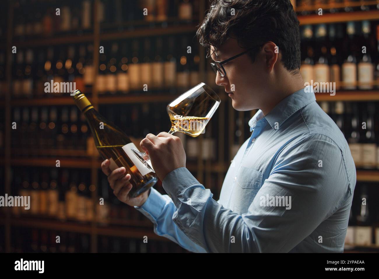 Professional Wine Expert Evaluating Quality and Checking Bottle Label ...