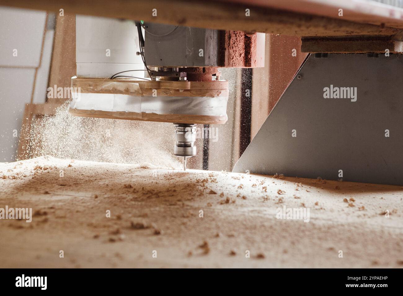 Machine tool in wood factory with drilling cnc machines. Computer ...