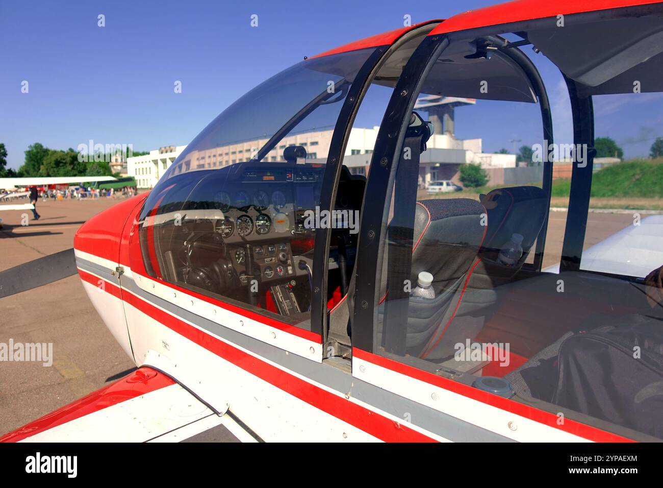 Open cockpit of a light aircraft against the sky Stock Photo - Alamy