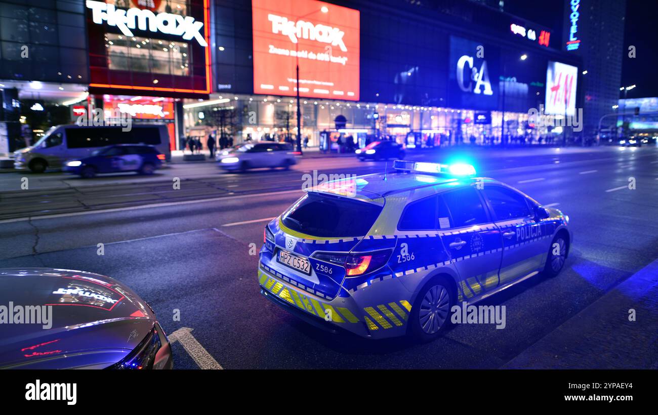 Warsaw, Poland. 22 November 2024. Police car on patrol with blue lights ...