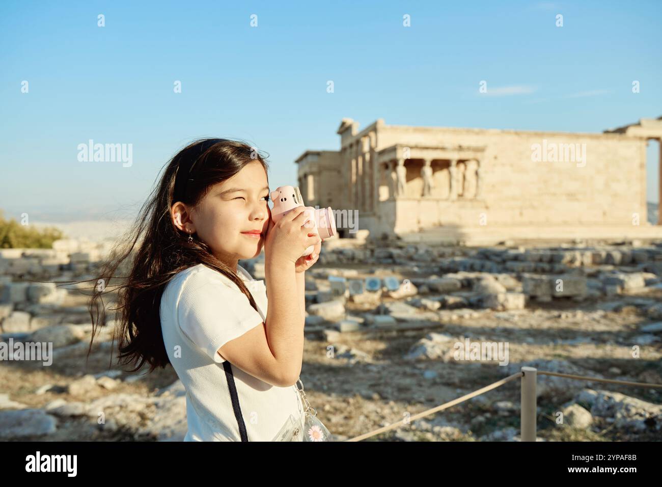 Girl is taking photos of the Parthenon at the Acropolis Stock Photo - Alamy