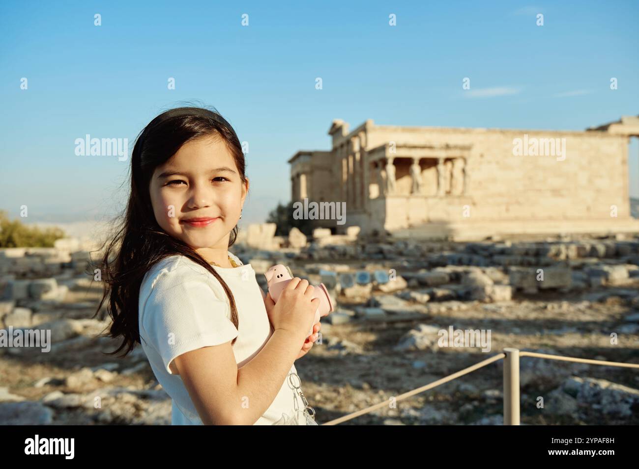 Girl is taking photos of the Parthenon at the Acropolis Stock Photo - Alamy