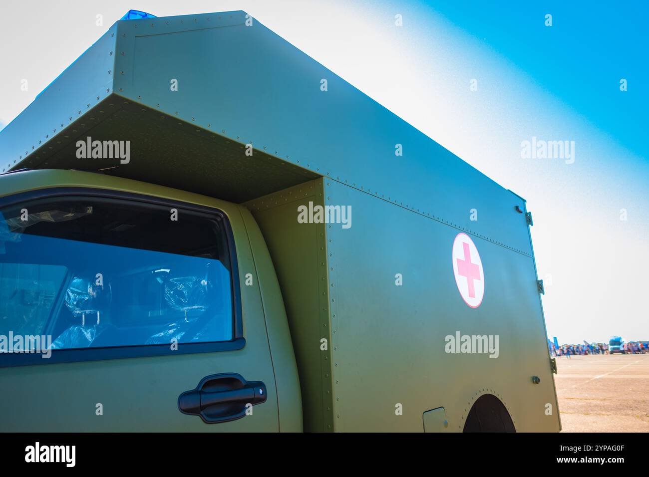 Armored ambulance car of green color Stock Photo - Alamy