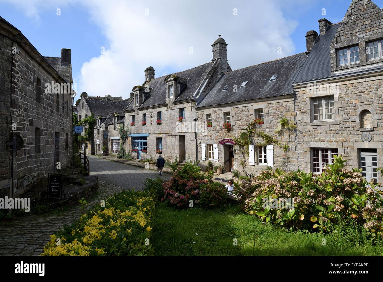 medieval stone houses in the village of Locronan, one of the most ...