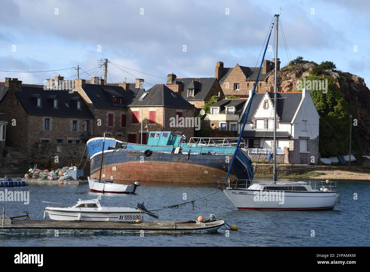 shipwreck of a former fishing boat stranded in the harbour of Loguivy ...
