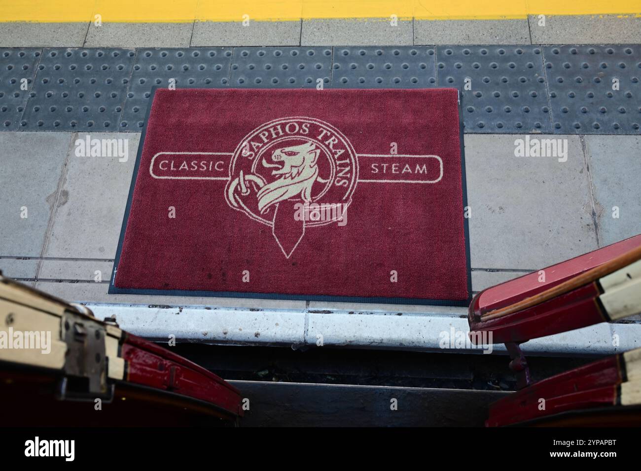 Saphos trains welcome mat on the platform for passengers leaving the ...