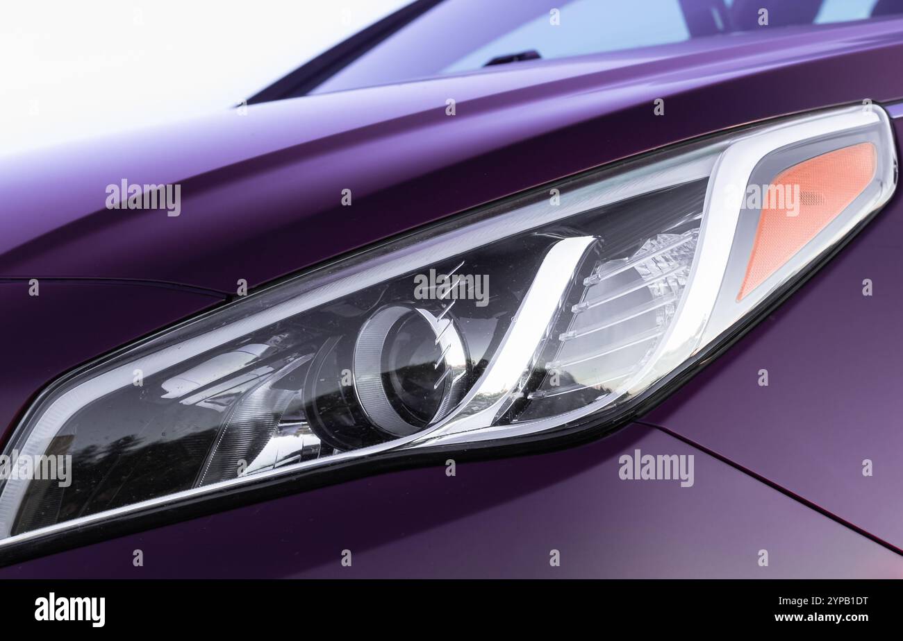 Front view of LED headlights sport car. Close up of headlight detail of ...