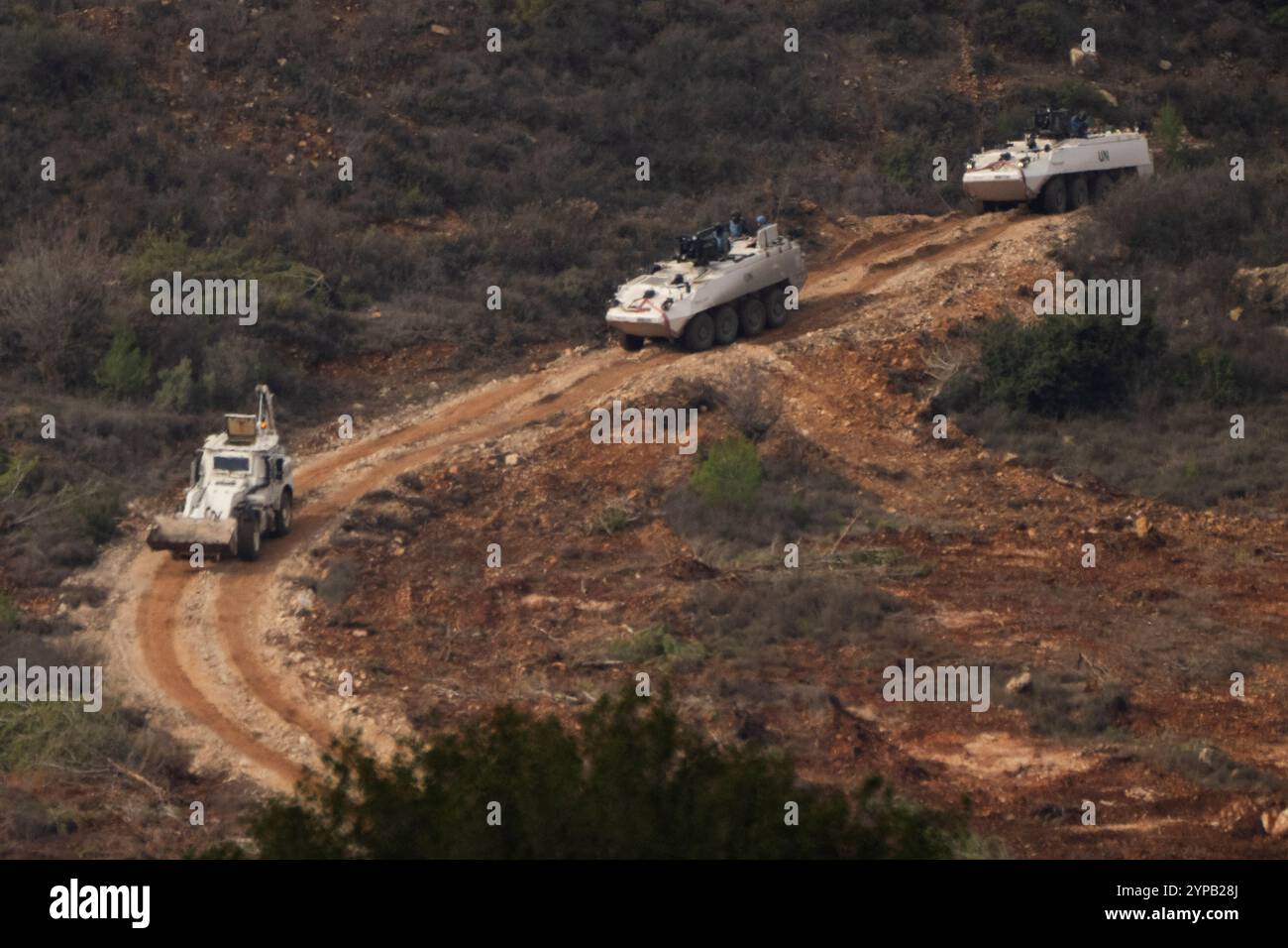 A convoy of armoured vehicles of the United Nations peacekeeping forces ...