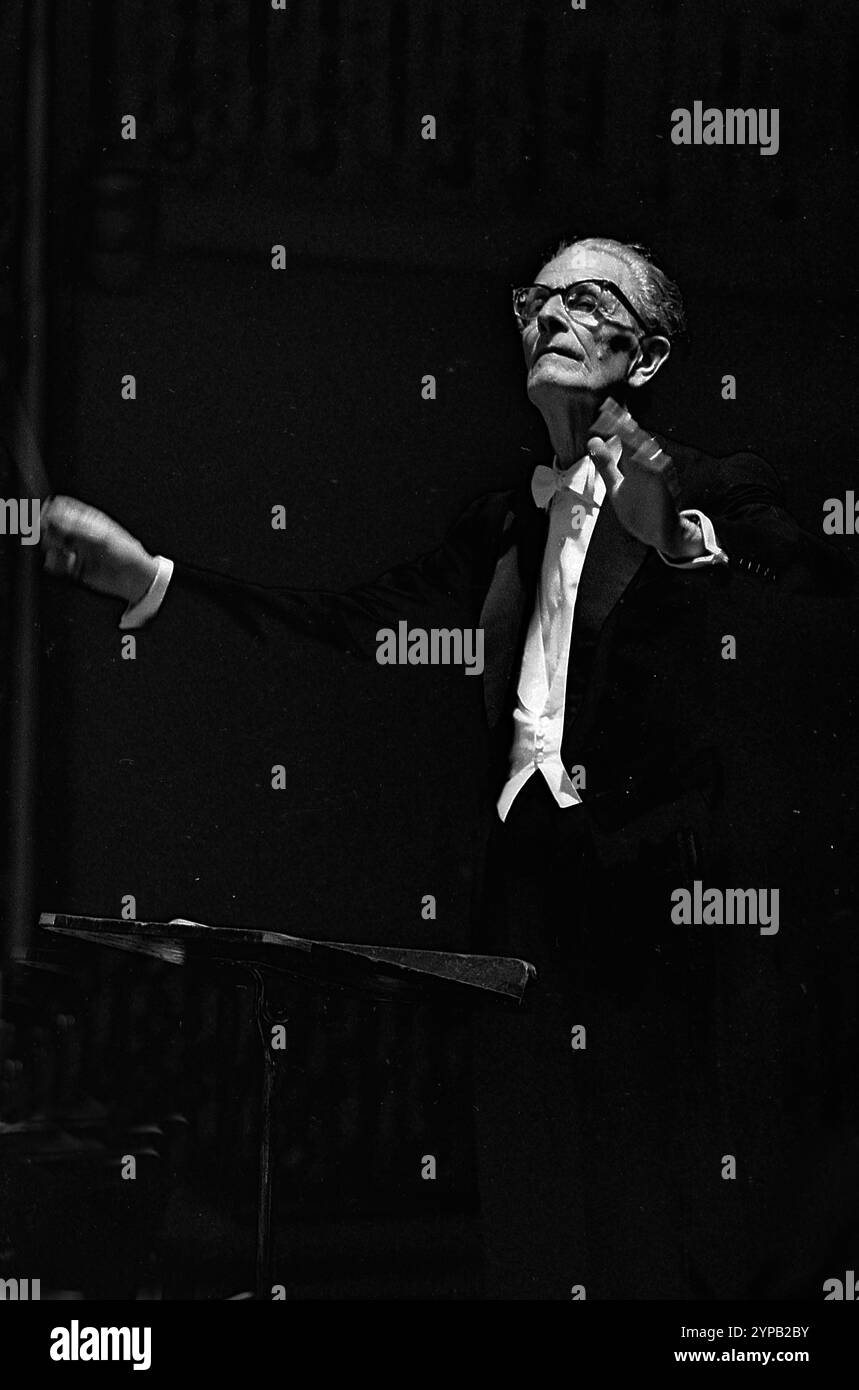 Swiss composer Frank Martin conducting an orchestra at the Teatro Odeón ...