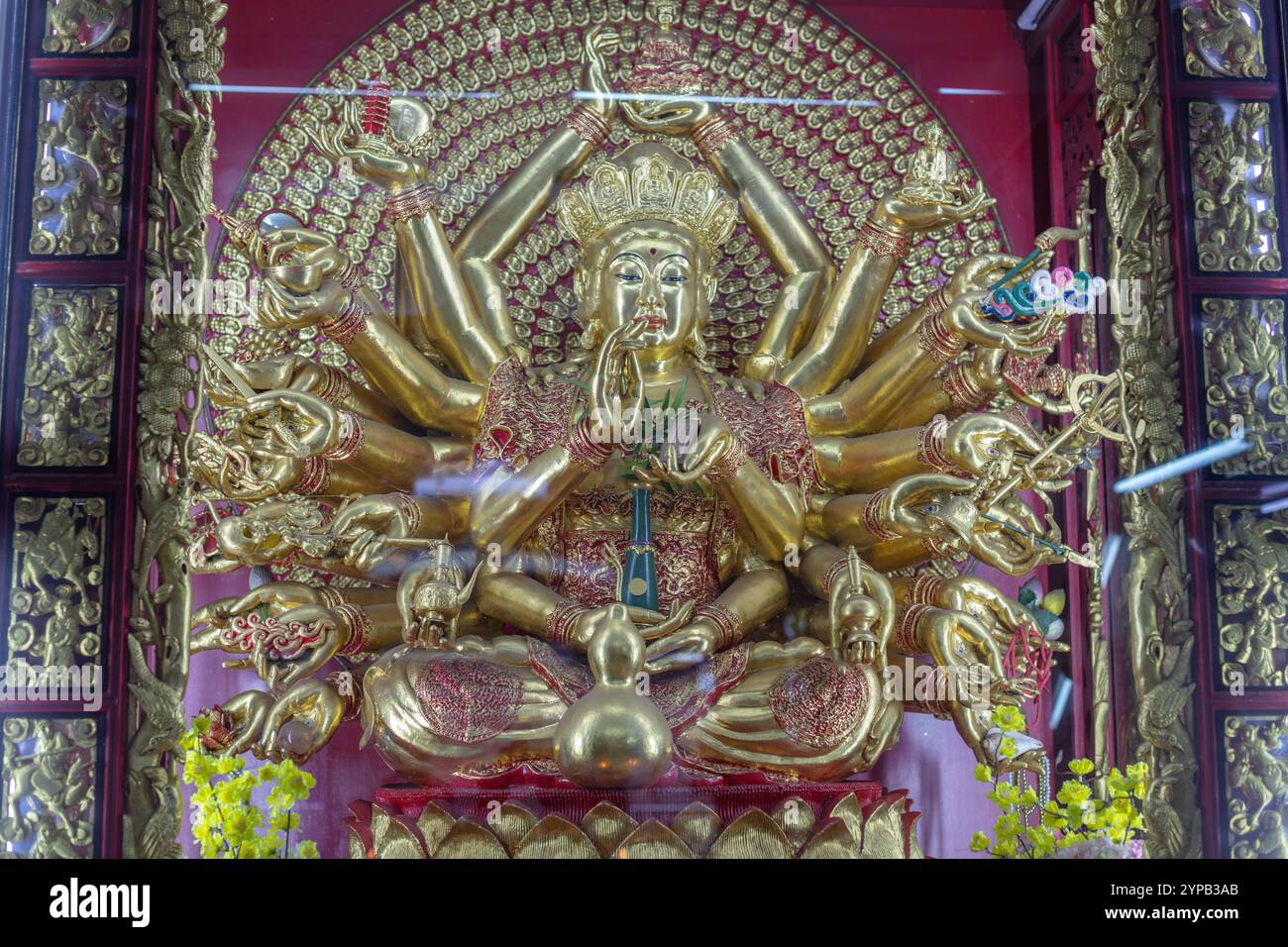 Statue of Thousand-armed Bodhisattva Avalokitesvara in a Chinese shrine ...