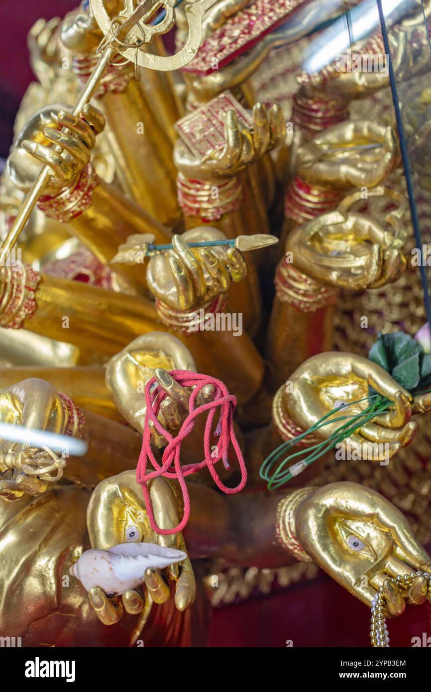 Statue of Thousand-armed Bodhisattva Avalokitesvara in a Chinese shrine ...