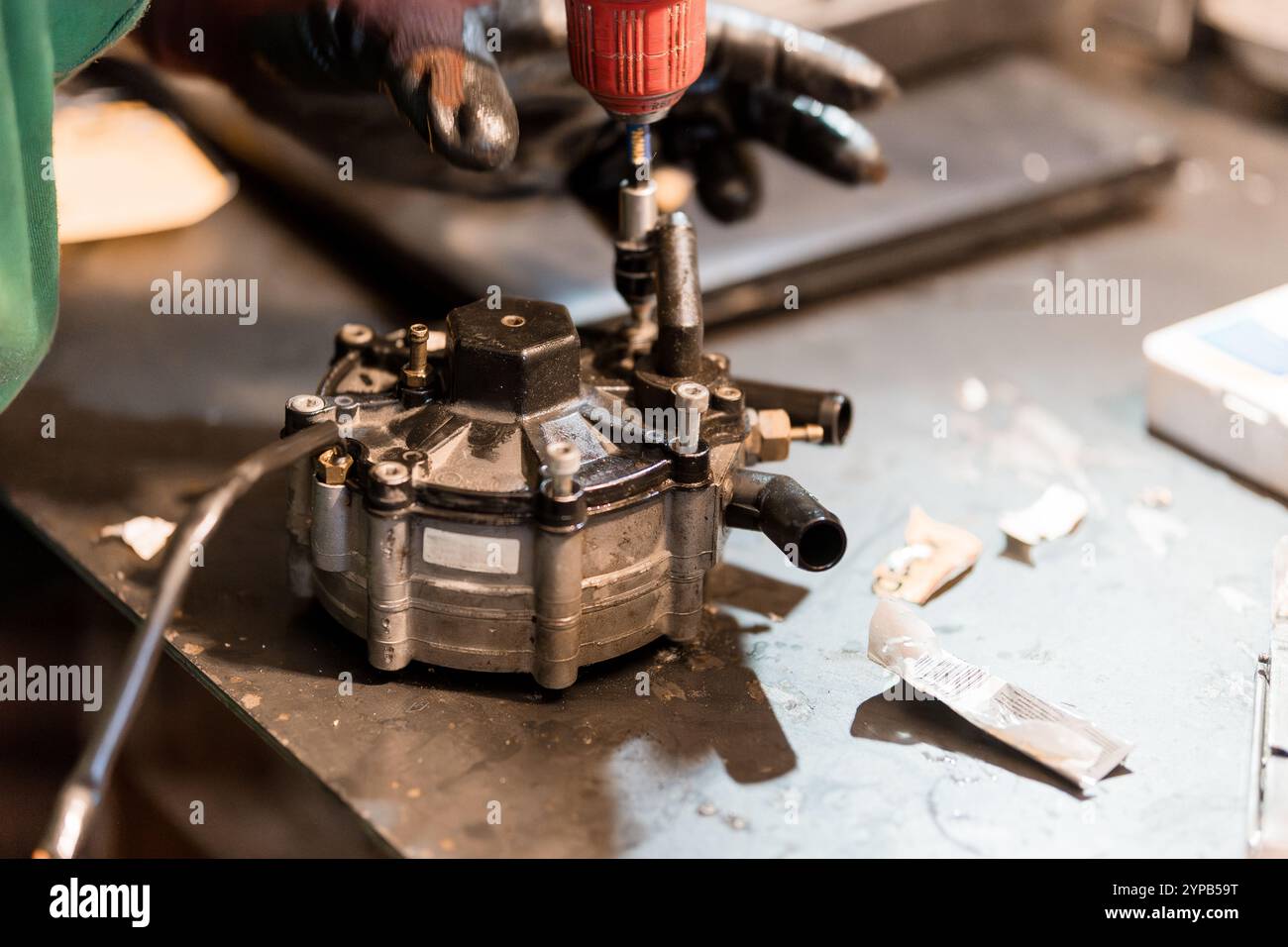 Car Engine Fuel Pump Repair Process on Workshop Bench Stock Photo - Alamy