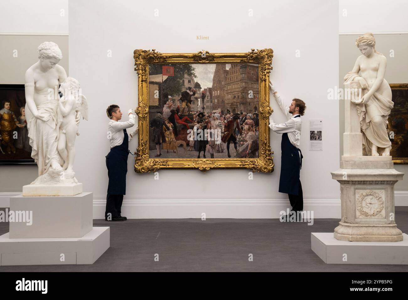 Art handlers hold Gustav Klimt and Ernst Klimt's Hanswurst Delivering ...