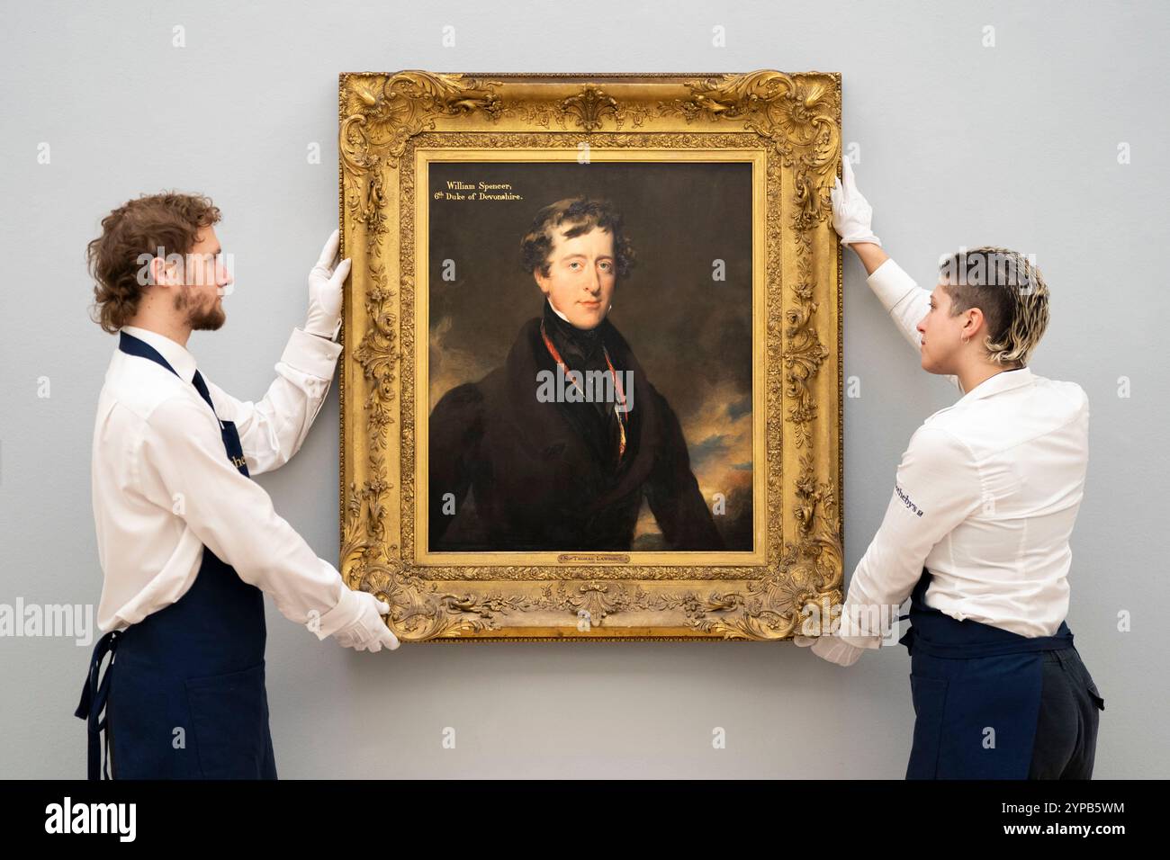 Art handlers hold Sir Thomas Lawrence's Portrait of William Spencer ...