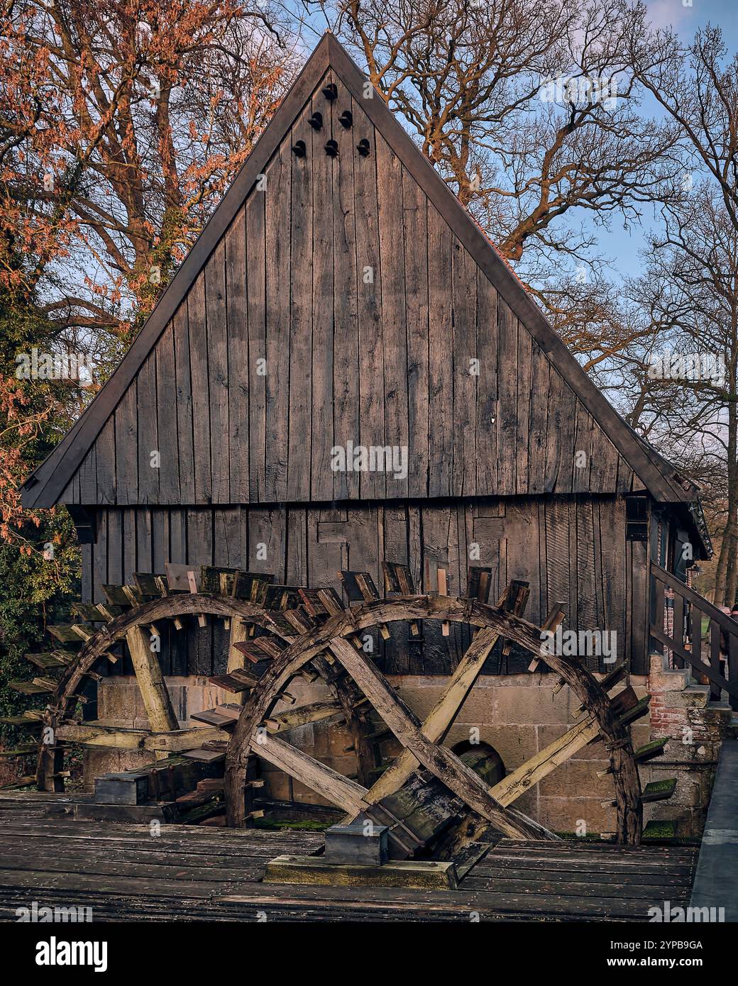 A beautifully preserved historic watermill in Lage, Germany, featuring ...