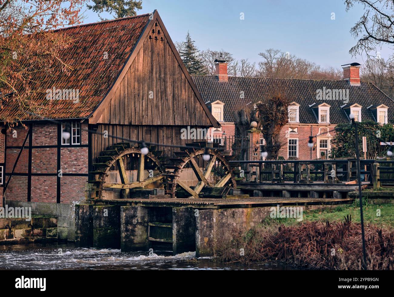 A beautifully preserved historic watermill in Lage, Germany, featuring ...