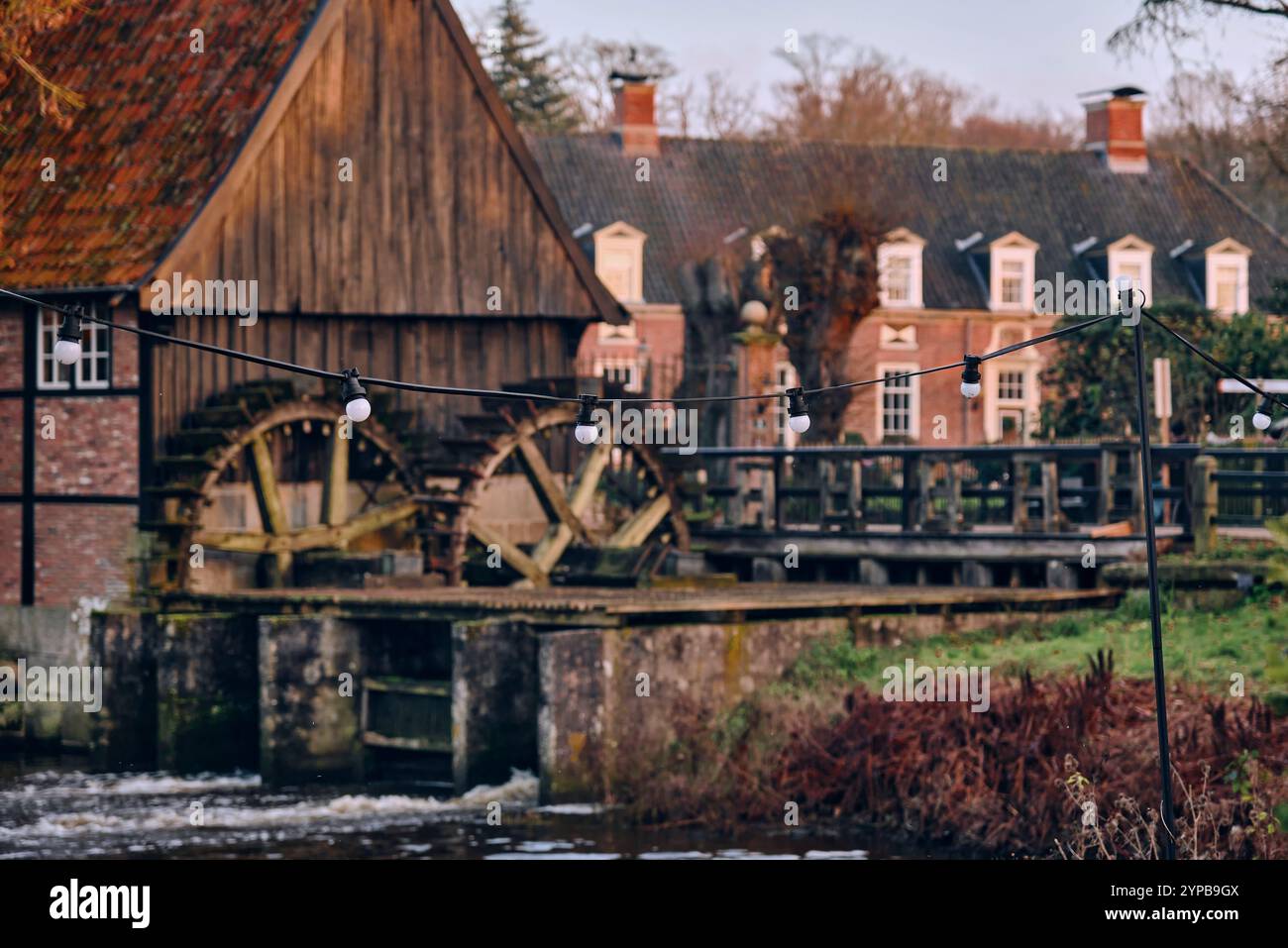 A beautifully preserved historic watermill in Lage, Germany, featuring ...