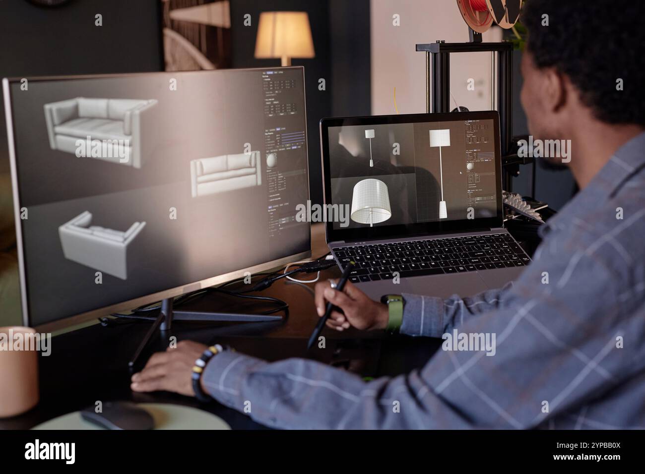 Woman designing 3D models on dual monitors in a modern office setting ...