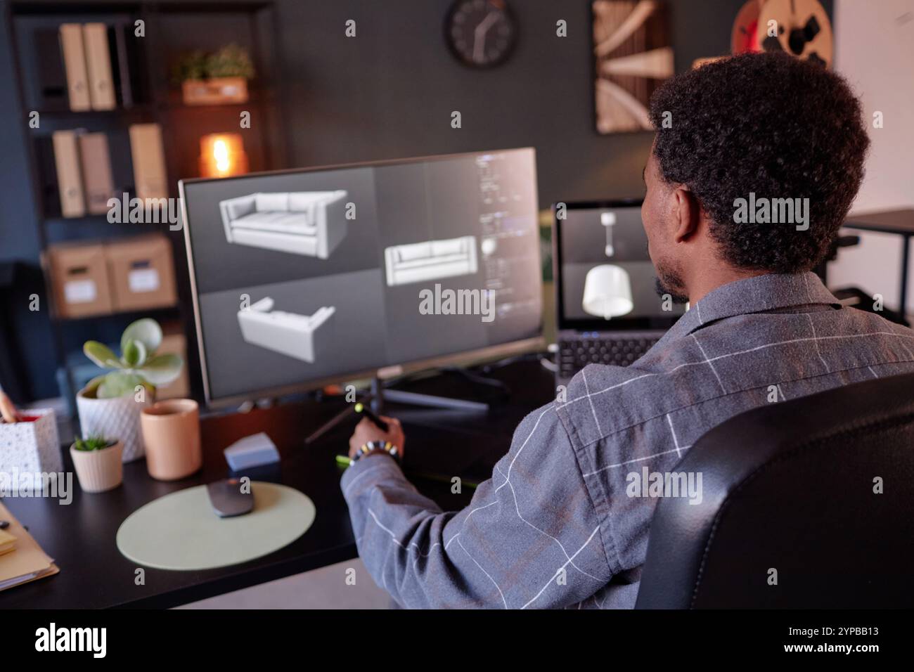 Designer working on detailed virtual models of contemporary furniture ...