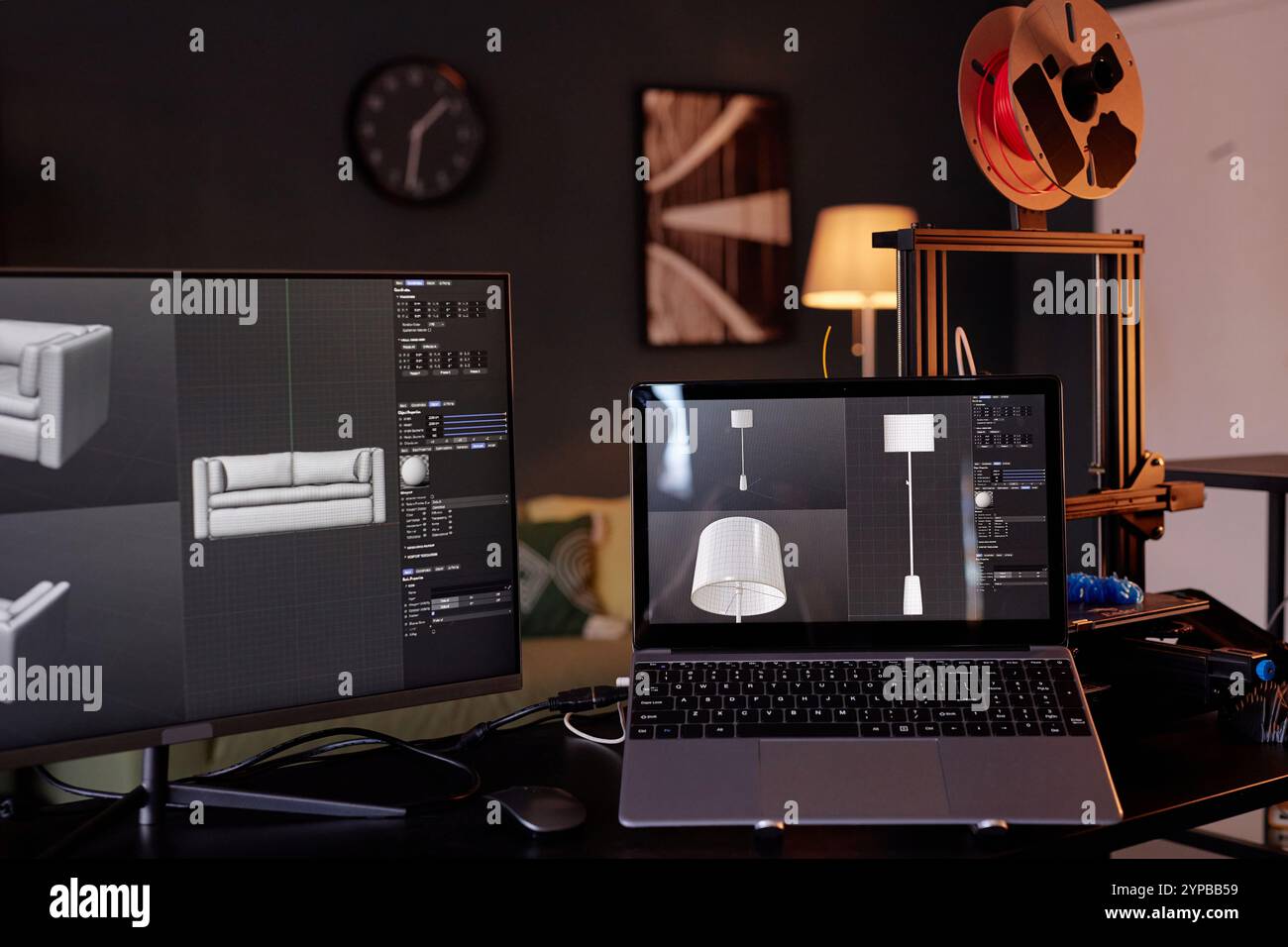 Workspace featuring computer screens displaying 3D designs for ...