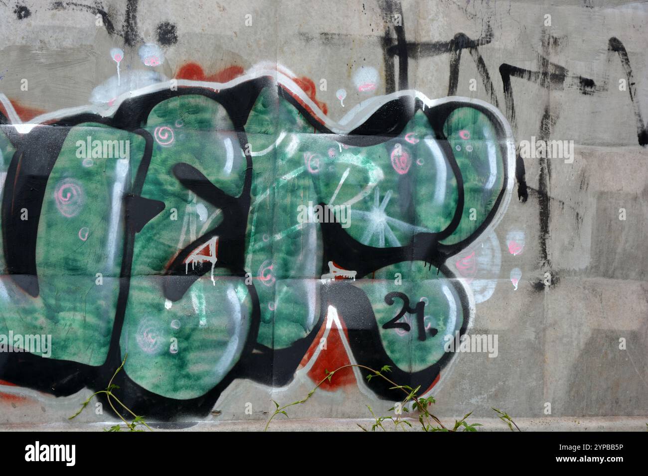 Green letters and white lines with thick black borders. A drawing ...