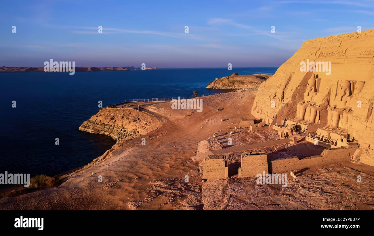 The sun rises on the Great Temple of Abu Simbel, Egypt, one of Egypt's ...
