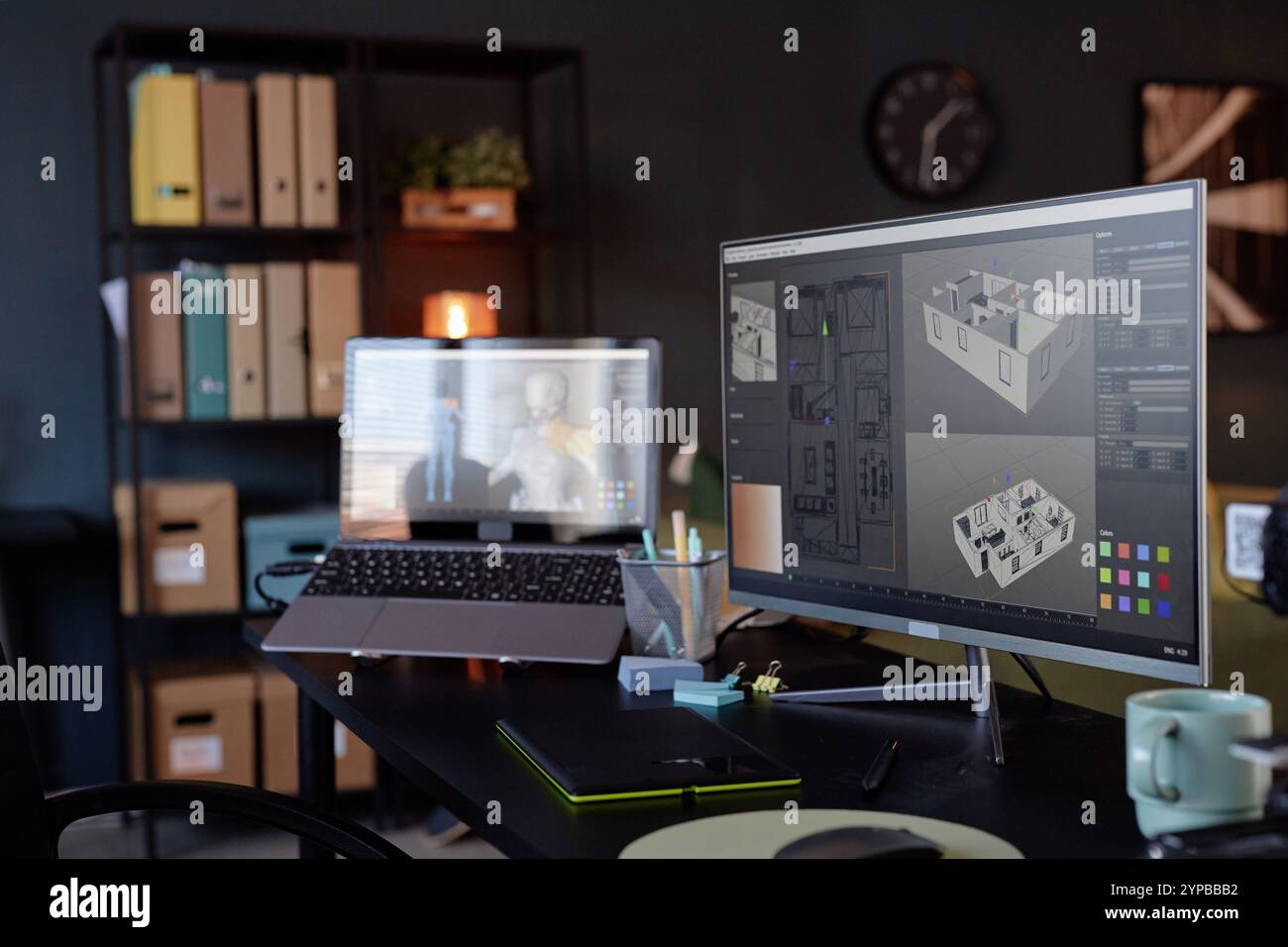 Modern office setting with computer screen displaying architectural ...