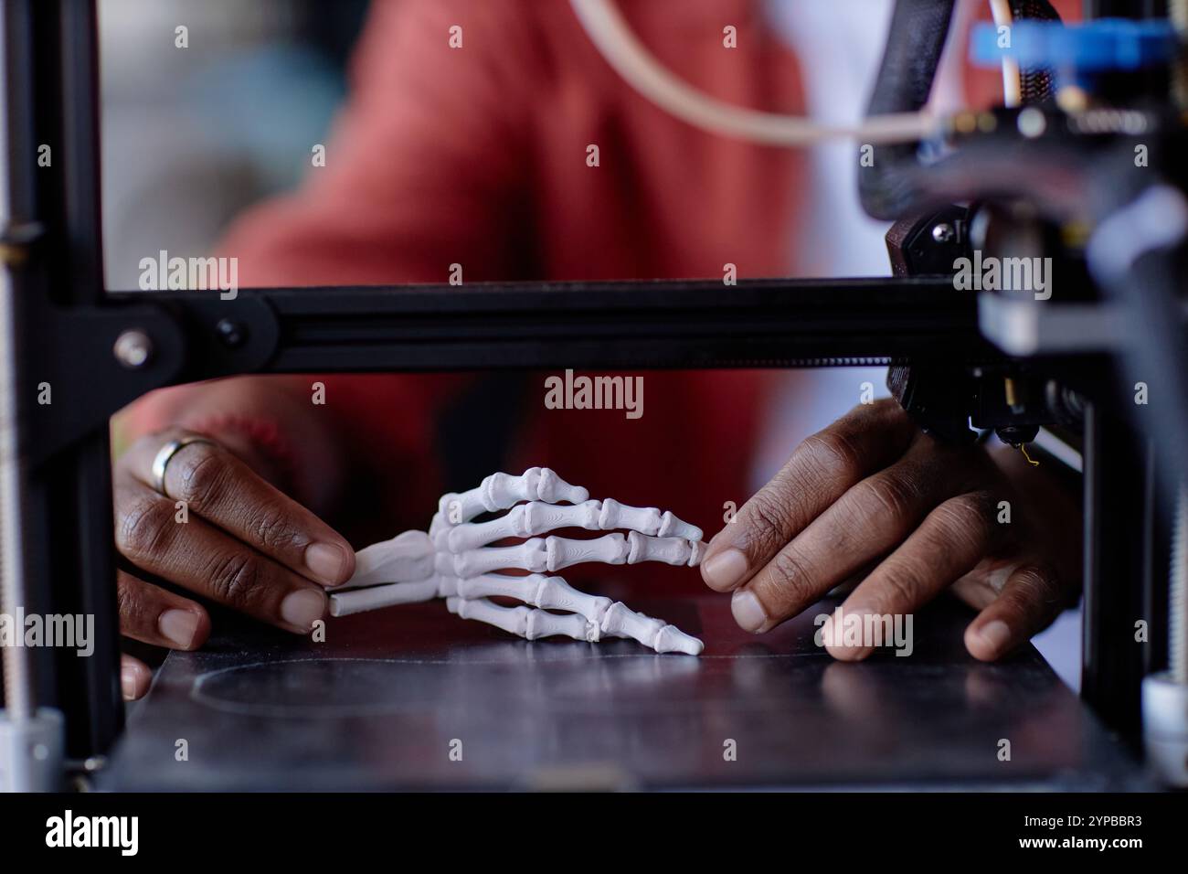 Close-up view highlighting person demonstrating intricate process of 3D ...