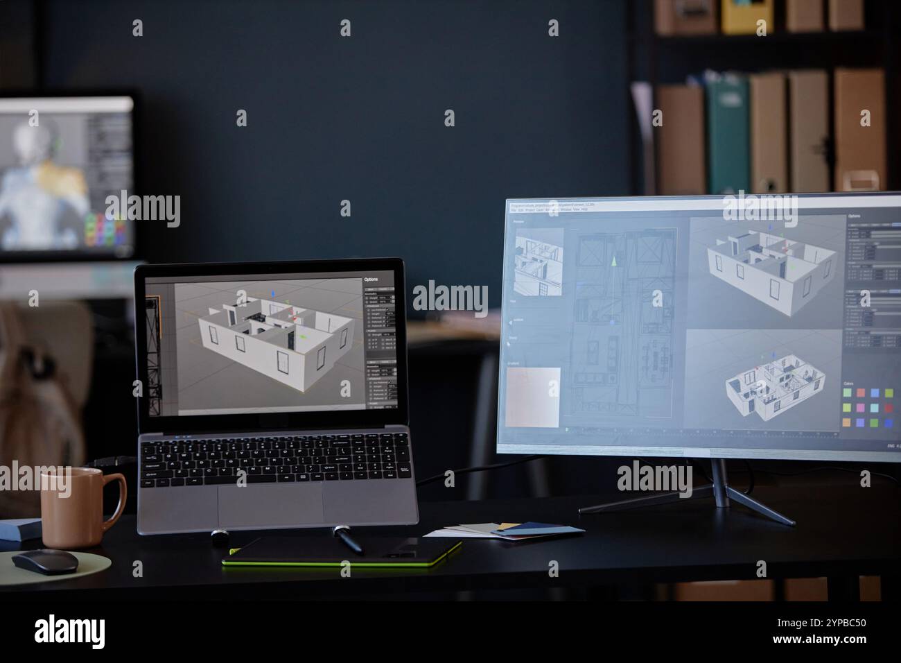 Dual monitors showing detailed 3D renderings of architectural designs ...