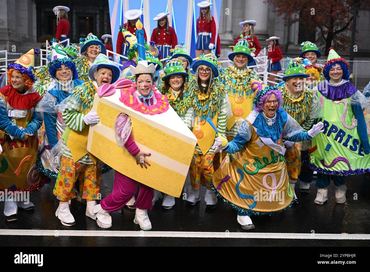 People in costume attend the 98th Annual Macy's Thanksgiving Day Parade ...