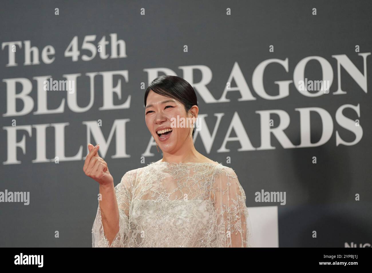 South Korean actress Yeom Hye-ran poses for photographers upon arrival ...