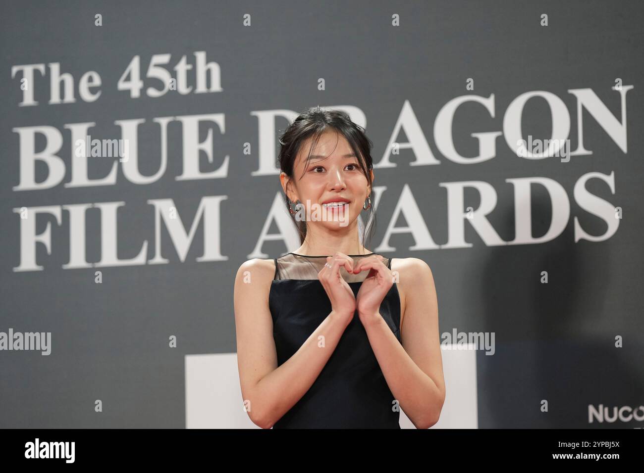 South Korean actress Lee Ju-myoung poses for photographers upon arrival ...