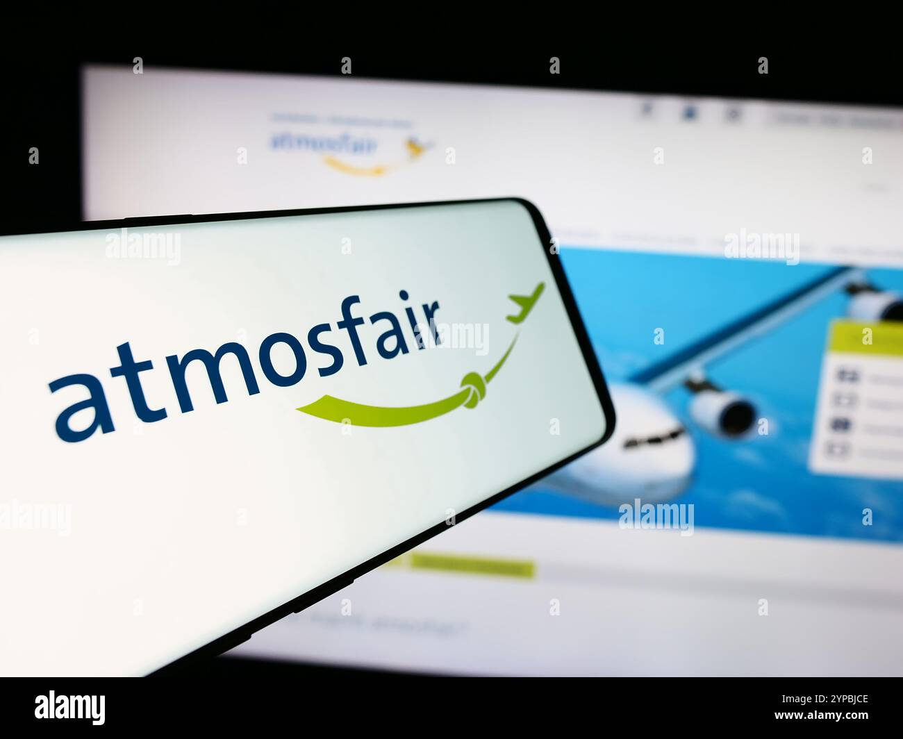 In this photo illustration, a mobile phone with the logo of German ...