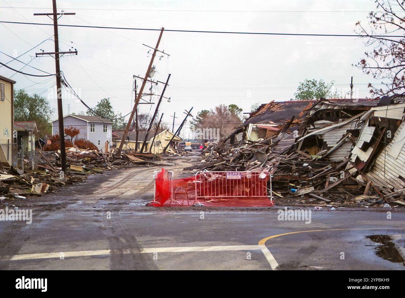 New Orleans, LA, USA - 2005: Destroyed homes, bent utility poles and ...