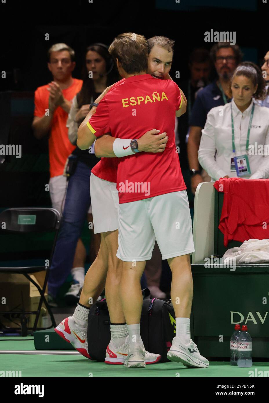 Rafael Nadal (ESP) hugs Team Captain David Ferrer after losing his last match before retiring ...