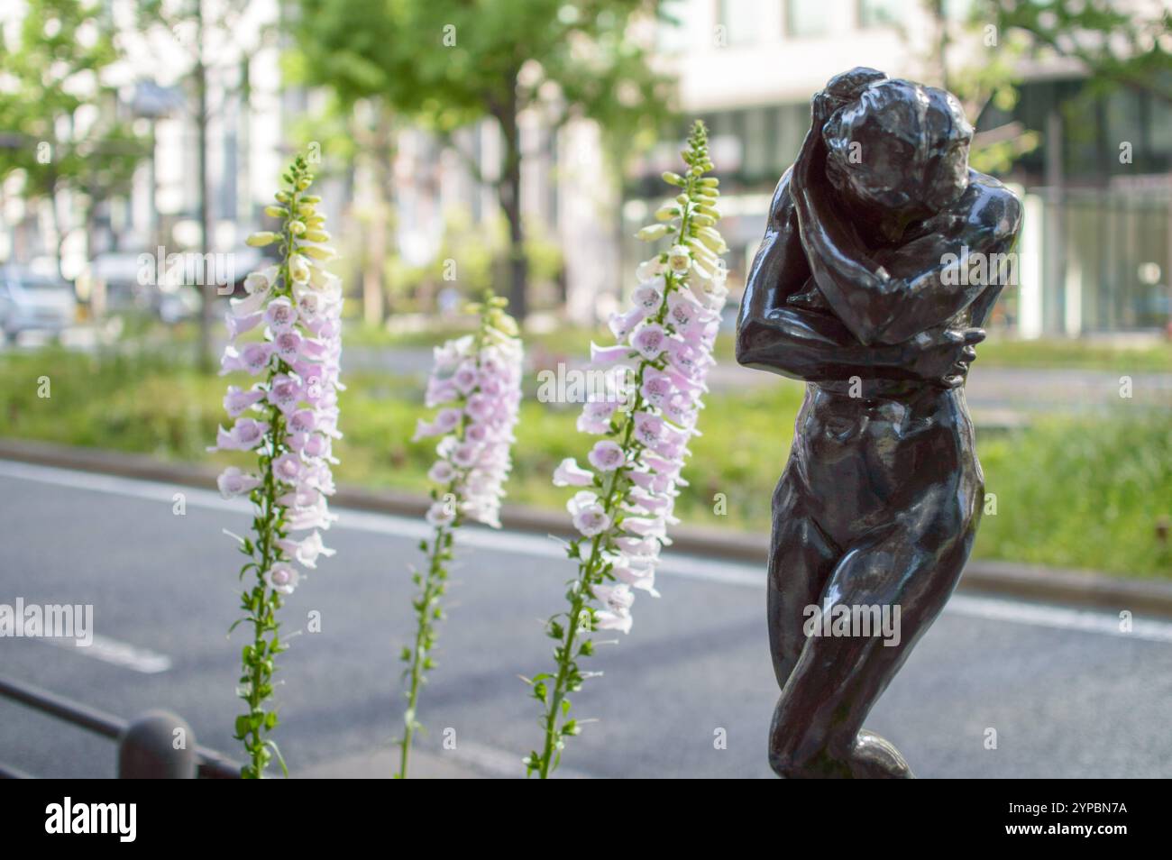 Artistic bronze sculpture on Midosuji avenue in central Osaka, Japan on ...