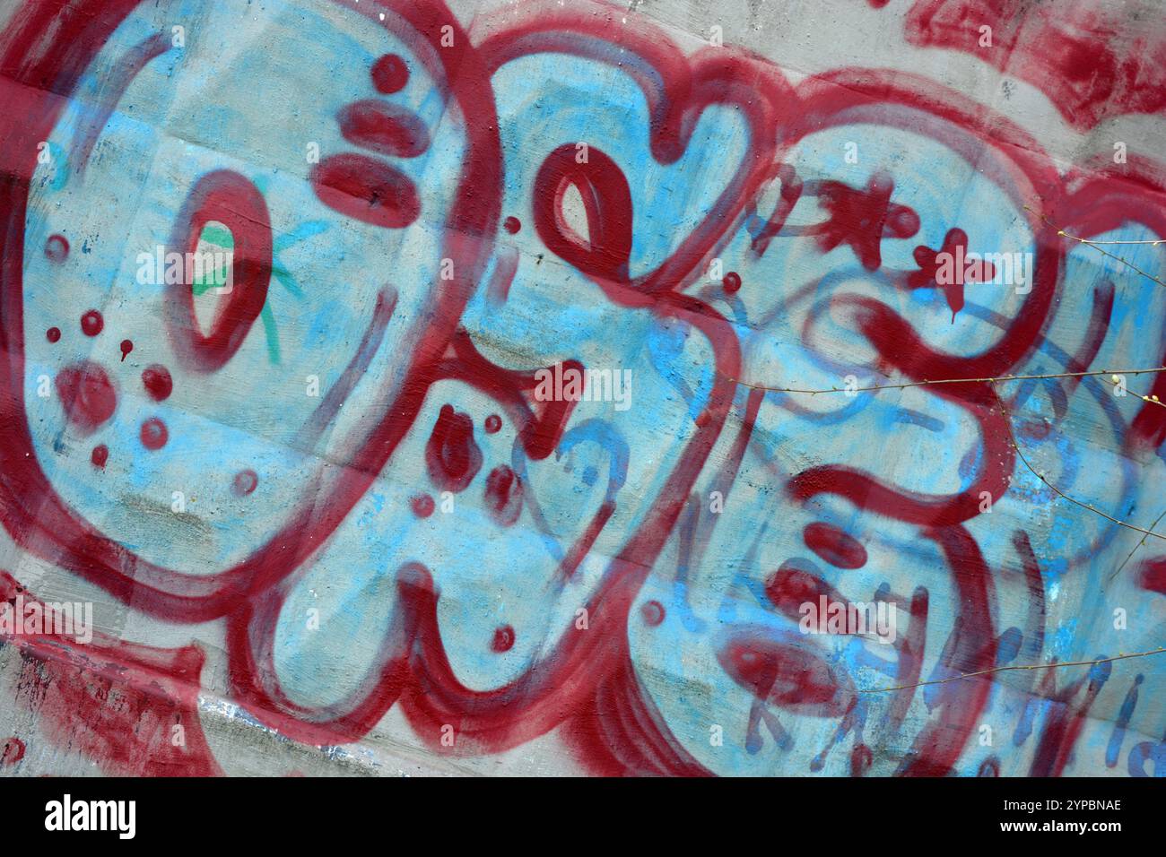 White, blue letters with red dashes, dots, circles, and lines with ...