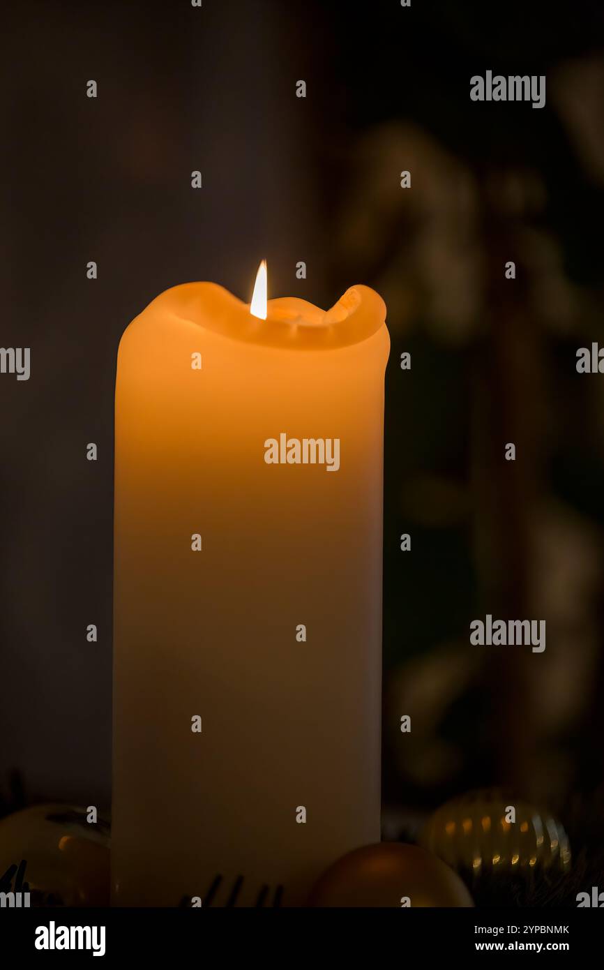 Single Burning Advent Candle - Hope and Faith in Christmas Season Stock ...