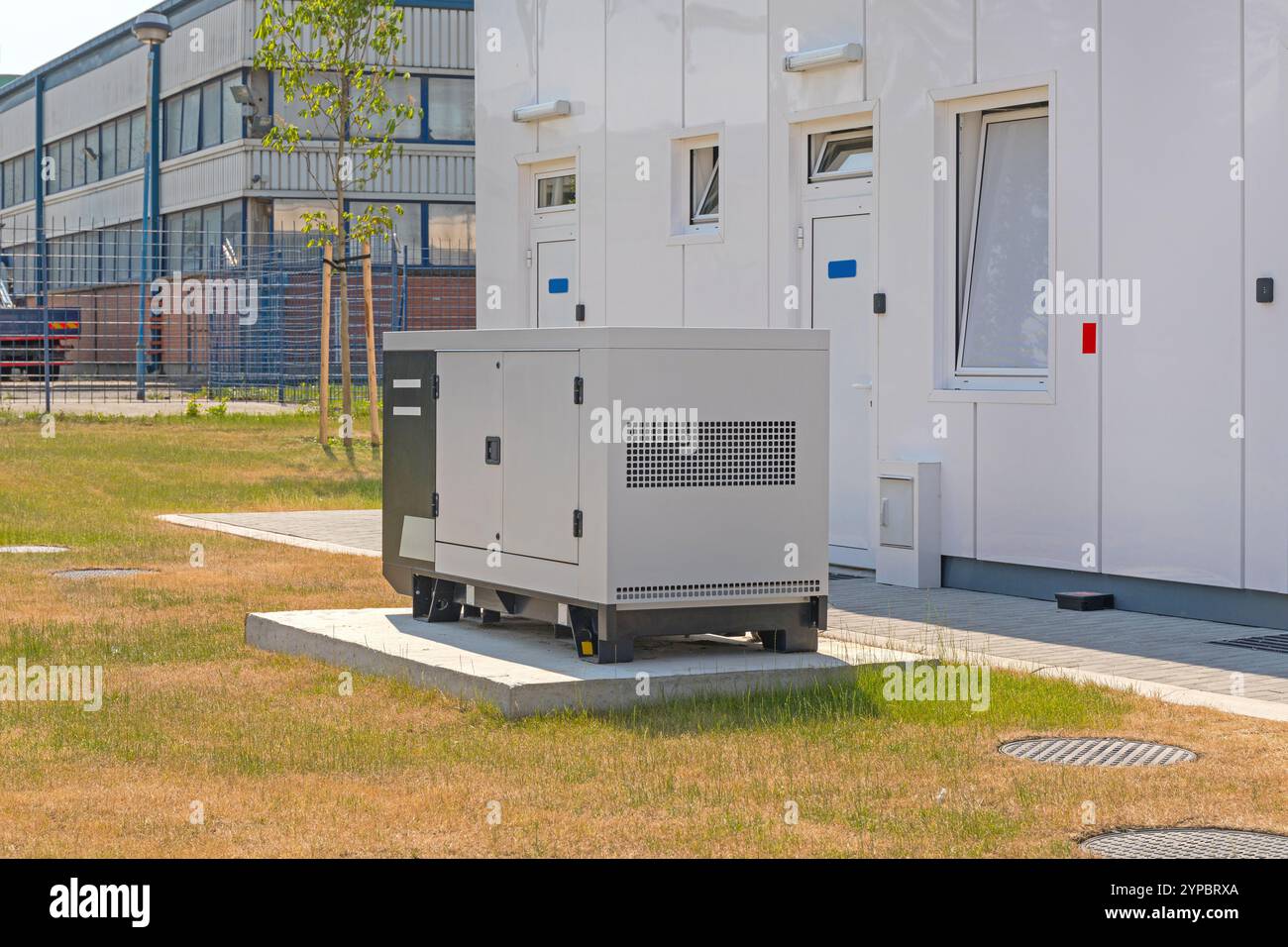 Emergency Power Generator at Stand by Behind Industrial Building Stock ...