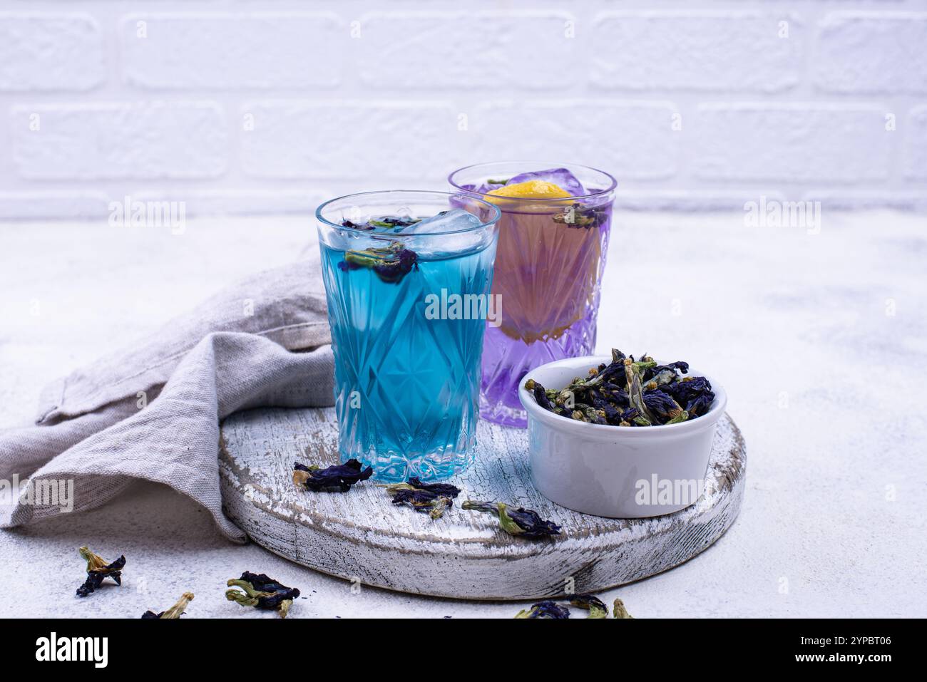 Cold blue and purple tea Butterfly pea Stock Photo - Alamy