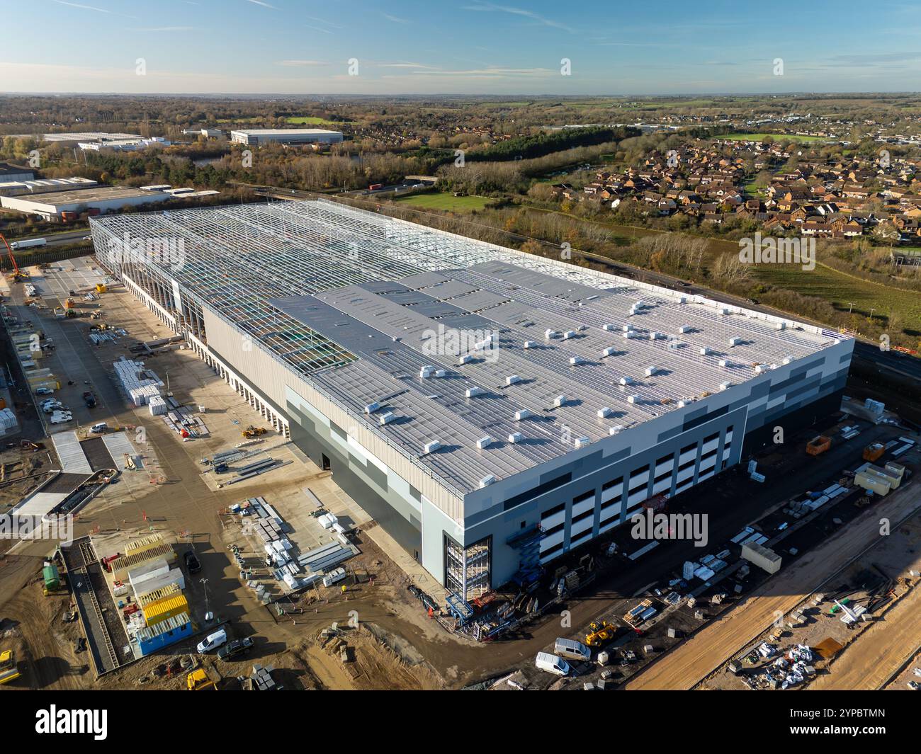 Aerial view of a large distribution center undergoing construction ...