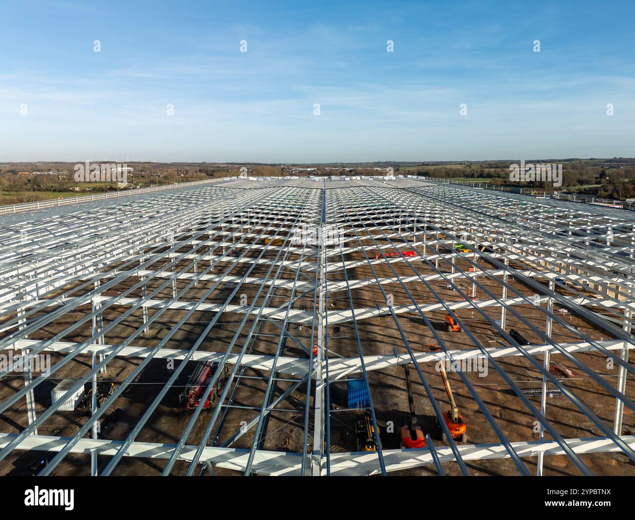 Construction site with steel frame of industrial building showing metal ...