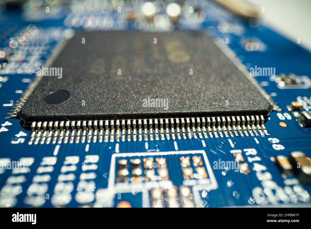 CPU electrons. Motherboard closeup. Circuit board with electrons. Electronic circuit board close ...