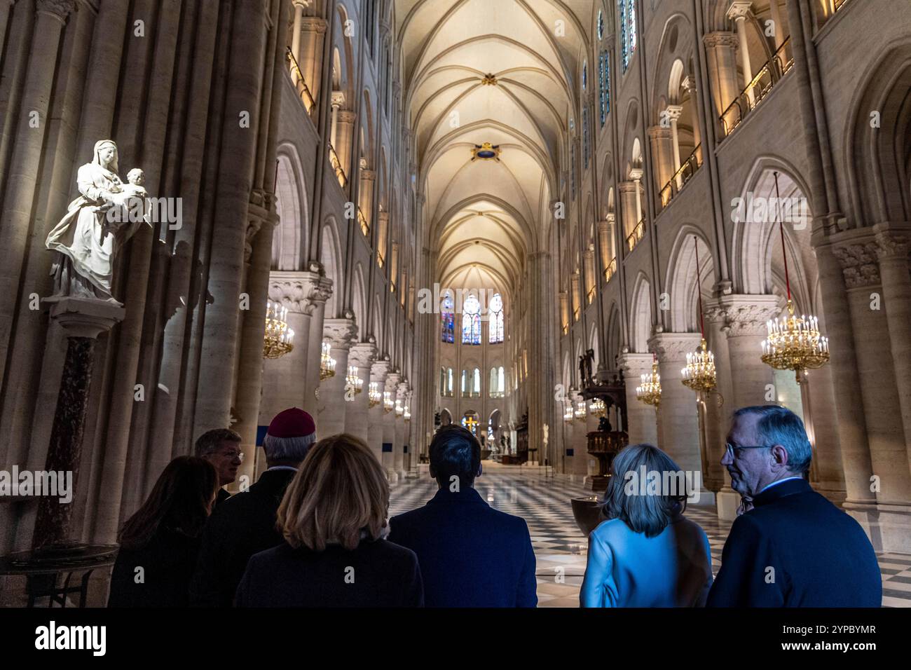 French President Emmanuel Macron, center, and his wife Brigitte Macron ...