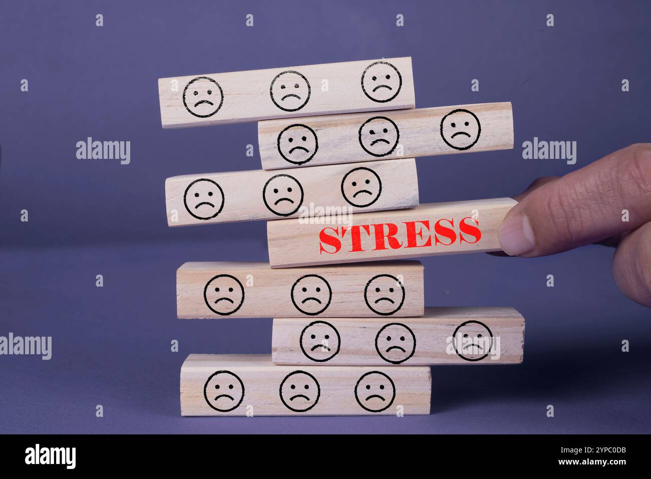 Stress symbol. Concept word Stress on wooden blocks. Beautiful blue ...