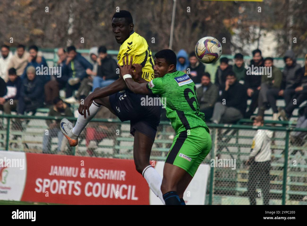 Abdou Karim (L) of Real Kashmir FC and Mashoor Shereef (R) of Gokulam ...