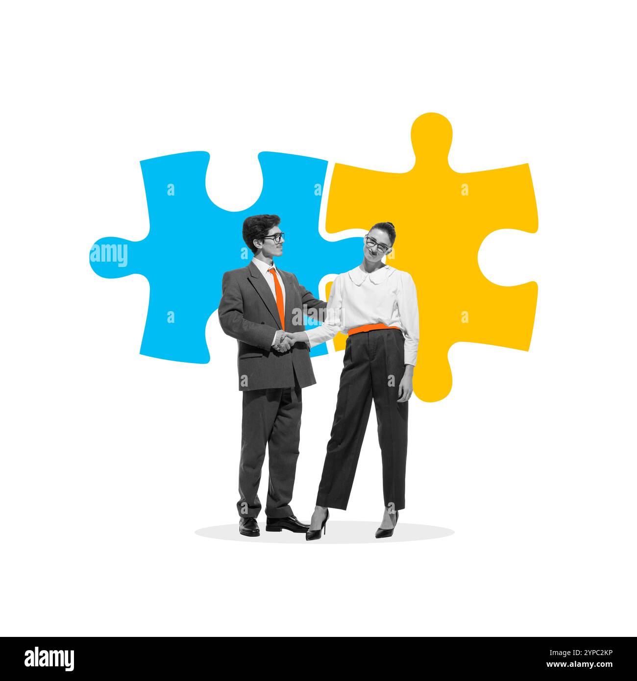 Two business professionals shaking hands with puzzle pieces in ...