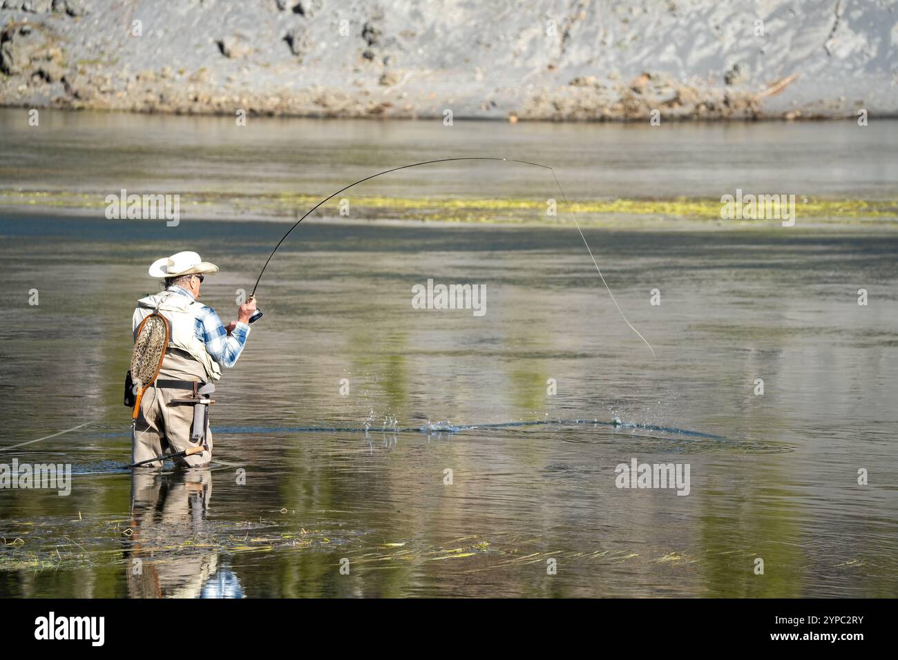 Angler in chest waders hi-res stock photography and images - Alamy